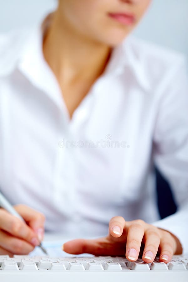 Touching keys stock image. Image of female, employment - 14945201
