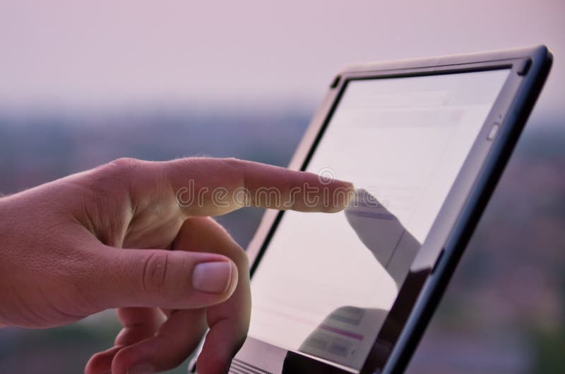 Touching screen on tablet stock photo. Image of tablet - 21829842