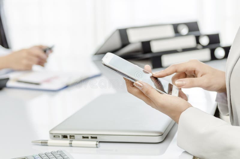 Touching smart phone stock photo. Image of folder, businesswoman - 34662794