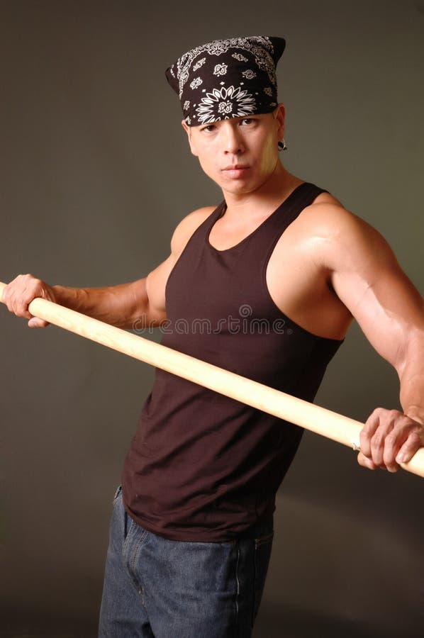 Buff guy in tank top stock photo. Image of crossed, jeans - 1406048