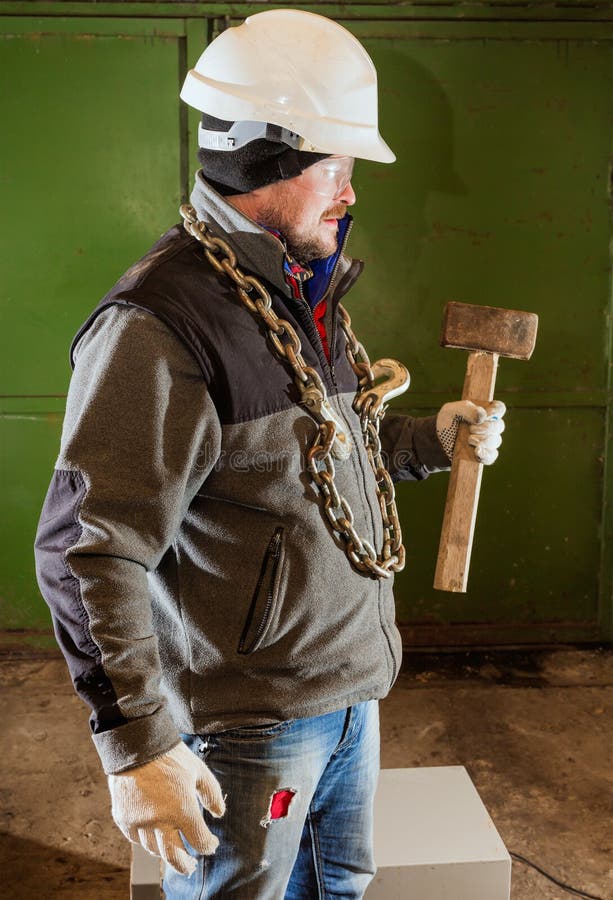 Tough Worker with Iron Chain and Sledgehammer Stock Photo - Image of ...