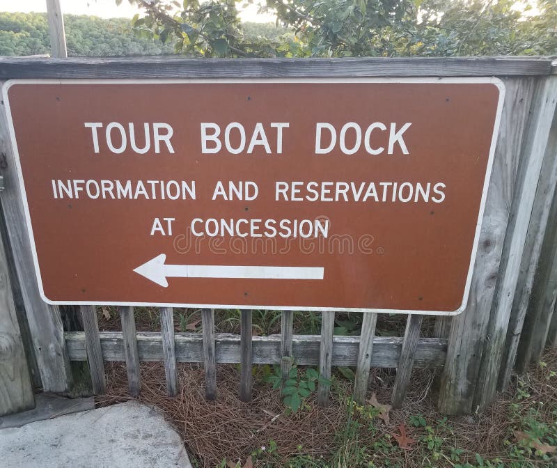 Tour Boat Dock Sign Information and Reservations Stock Photo - Image of ...