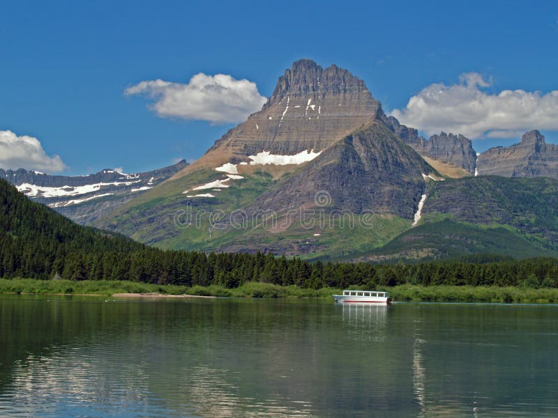 Tour Boat on Swiftcurrent Lake Stock Image - Image of lake, forest ...