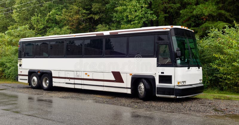 Tour Bus Parked in the Rain Stock Photo - Image of travel, vehicle ...