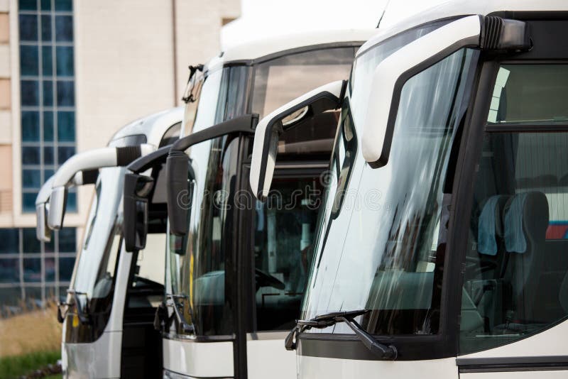 Tour buses in a row stock image. Image of terminal, window - 107341411