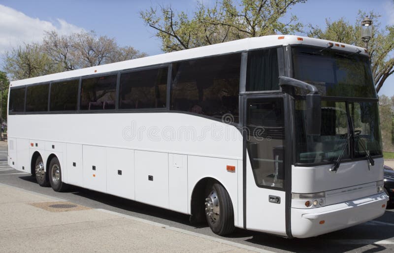 White Tour Bus stock photo. Image of mass, hotel, drive - 10177874