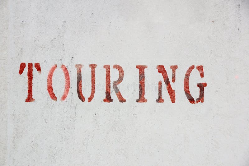 Touring Sign Written on Wall . Close Up Stock Photo - Image of touring ...