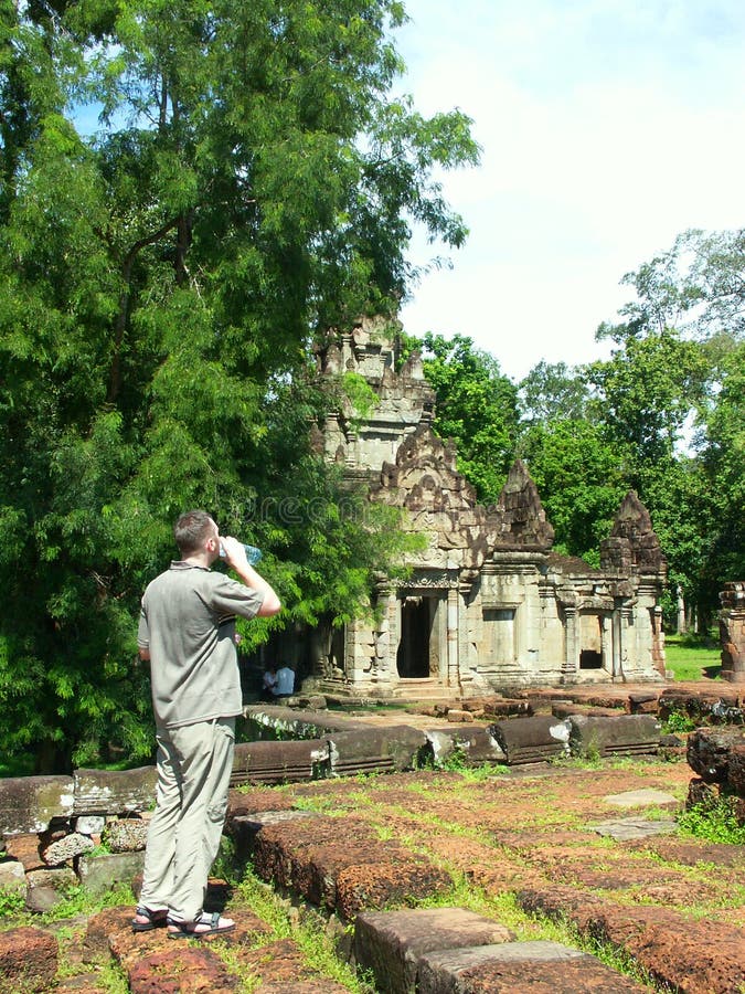 A Tourist In Angkor Wat Temple Stock Image - Image of heritage, angkor ...
