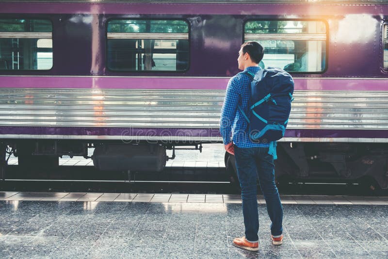 Tourist Backpacker Using Map To Travel at Train Station Stock Image ...