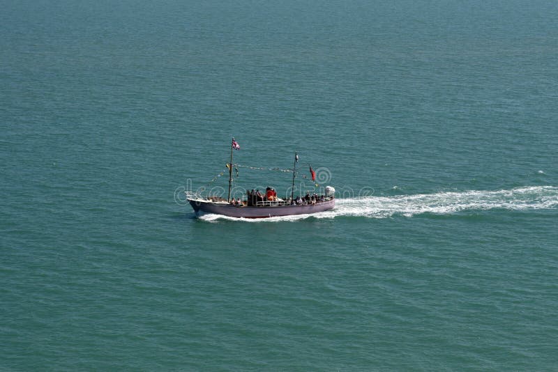 A Tourist Boat Ferrying Passengers at Sea Stock Image - Image of summer ...