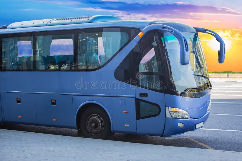 Tourist Bus Stopping at Sunset in the Cloudy Sky Stock Image - Image of ...