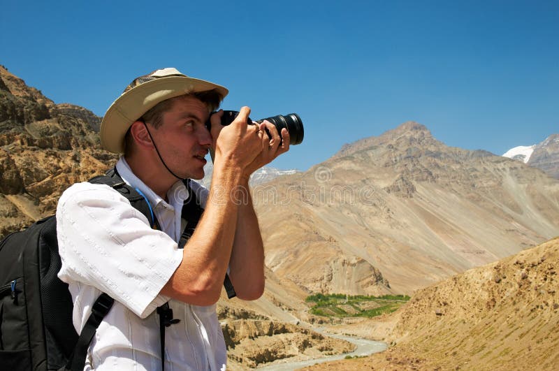 Tourist with Camera in Mountains Stock Image - Image of camera, travel ...