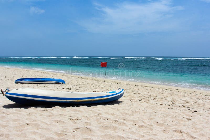 Tourist Canoe at the Beach stock photo. Image of ocean - 210992108