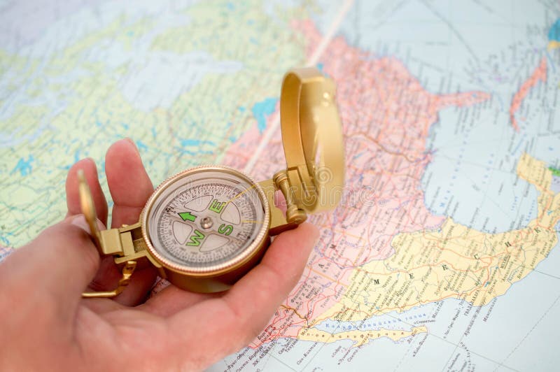 Tourist Compass Hand Over Map Stock Photos - Free & Royalty-Free Stock ...