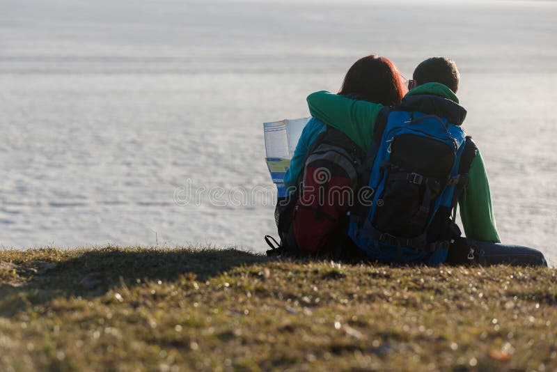 Tourist Couple Looking at Water Stock Photo - Image of sport, taking ...