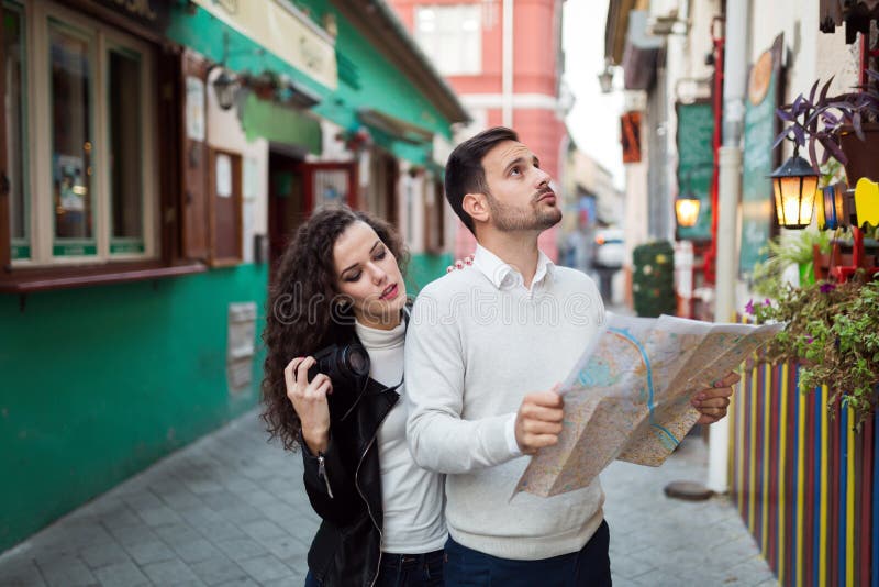 Tourist Couple Searching for Destination Stock Photo - Image of ...