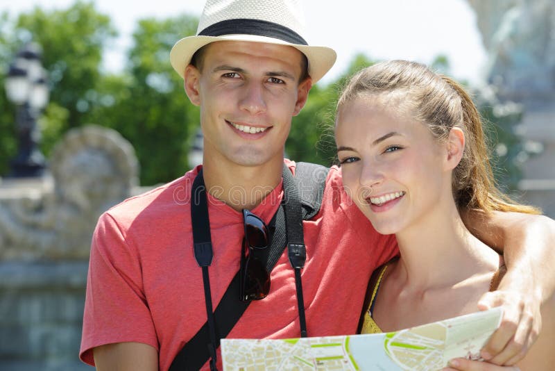 Tourist Couple Using Map As Guide Stock Image - Image of beautiful ...