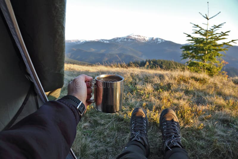 Tourist with a Cup of Coffee in Tent with Mountain View Stock Photo ...