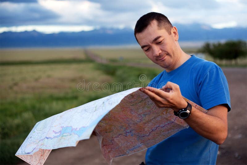Tourist exploring the map stock photo. Image of exploration - 20375468