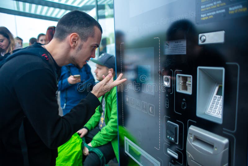A Tourist Guy Buys a Bus Ticket for the First Time Using an Electronic ...