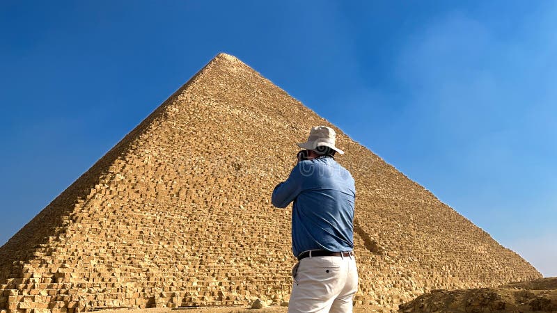 Tourist with a Hat Photographing a Pyramid in Egypt Stock Photo - Image ...