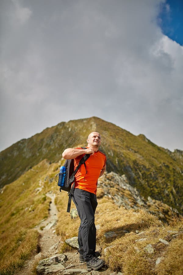 Tourist hiking with camera stock photo. Image of outside - 158634124