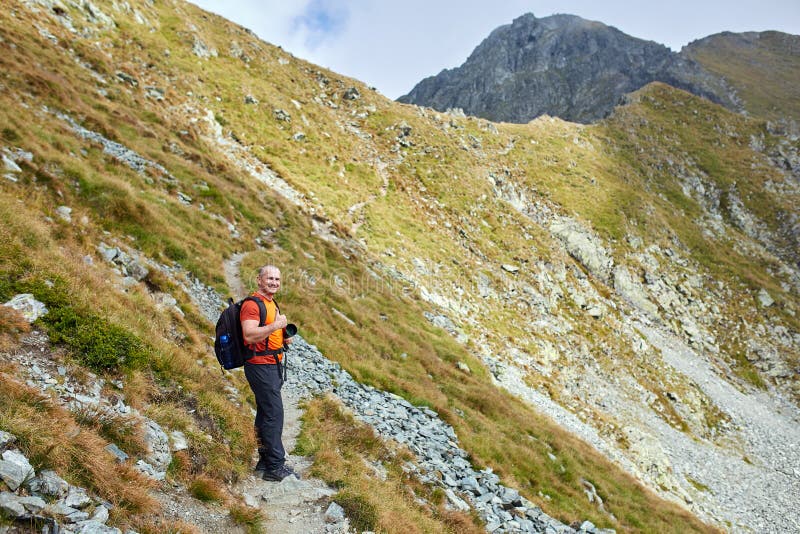 Tourist hiking with camera stock image. Image of people - 158634145