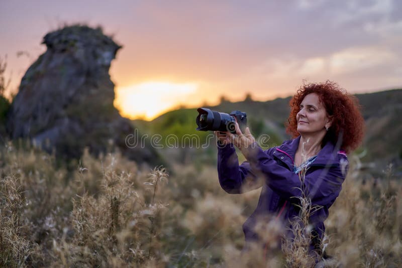 Tourist Lady with Camera at Sunset Stock Photo - Image of active, green ...