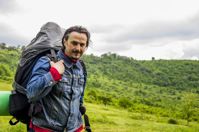 A Tourist Man with Big Backpack in the Forest Stock Photo - Image of ...