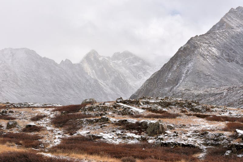 Tourist Paths Go Around a Stone Ledge on the Mountainside Sprinkled ...