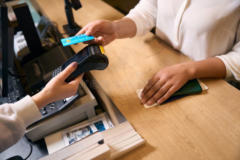Tourist Paying for Her Hotel Room at Front Desk Stock Image - Image of ...