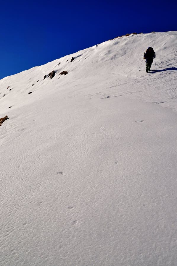 The Tourist on a Snow Hillside. Stock Image - Image of nature, campaign ...