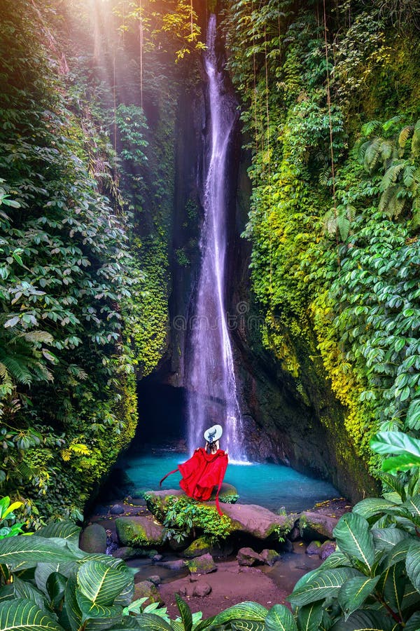 Tourist Standing at Leke Leke Waterfall in Bali, Indonesia Stock Photo ...