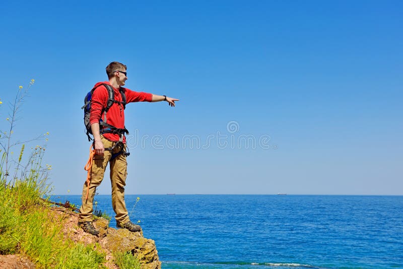 Climber Pointing To Ocean Stock Photos - Free & Royalty-Free Stock ...