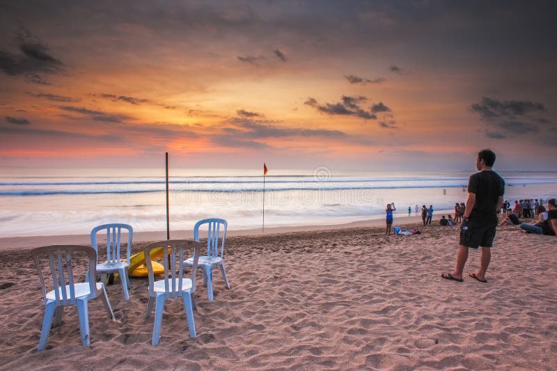 Tourist Viewing Sunset at Kuta Beach, Bali. Editorial Photo - Image of ...