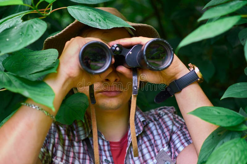 Man Explorer Looking Out Bushes Stock Photos - Free & Royalty-Free ...