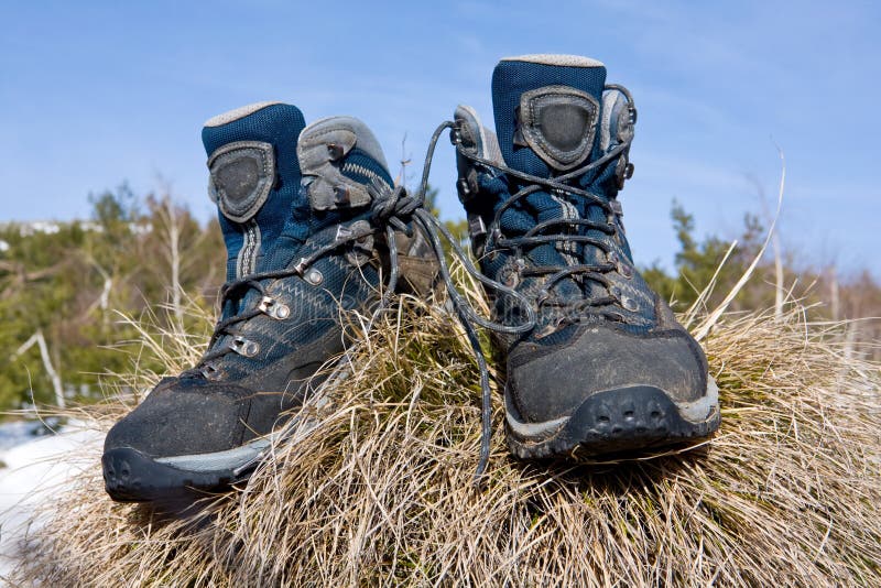 Tourists boots on grass stock photo. Image of person - 13641456