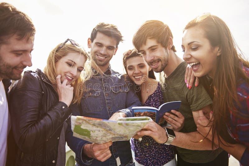 Tourists checking the map stock image. Image of direction - 58883951