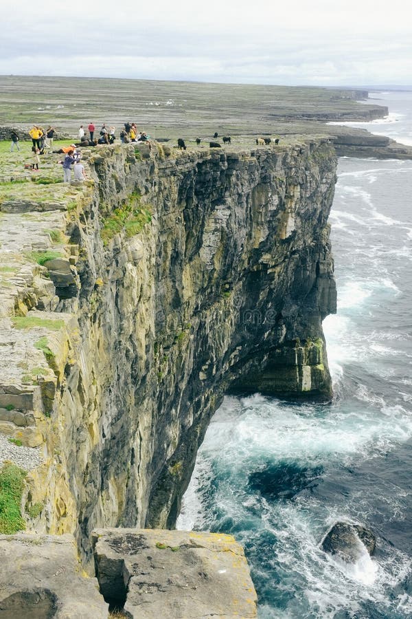 Tourists Courageously Look Down a Cliff Editorial Image - Image of ...