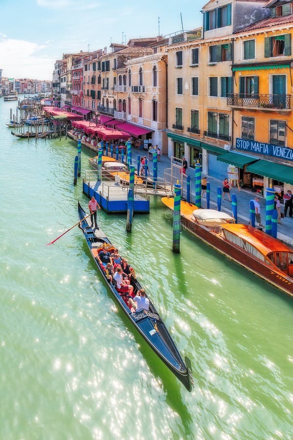 Tourists In A Gondola On The Grand Canal In Venice Editorial Stock