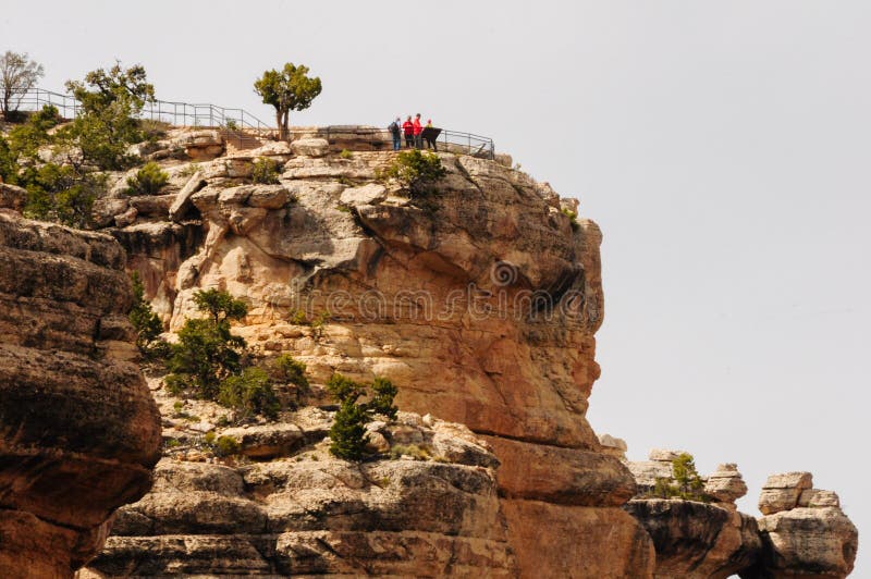 Tourists at Grand Canyon Overlook with Breathtaking Views and Rugged ...