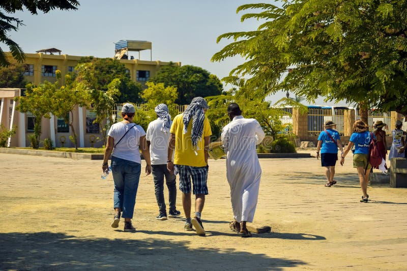 Tourists with Guide on Excursion. Travel Tour Group is Exploring Sights ...