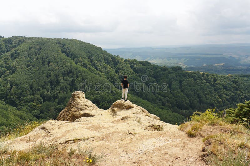 Tourists Looking from High Mountain To View Below Stock Photo - Image ...