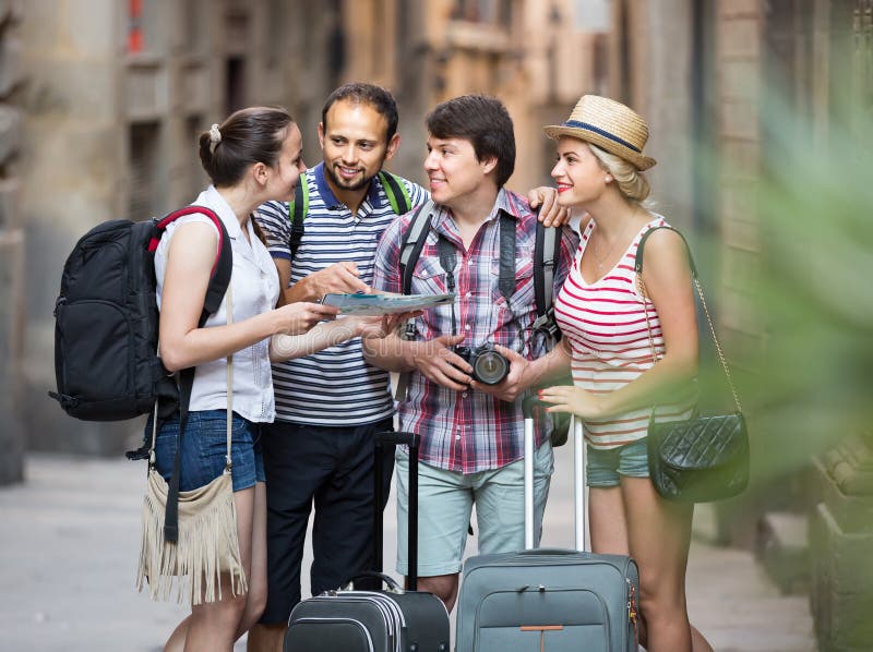 Tourists with Map Exploring the City Destination Stock Photo - Image of ...