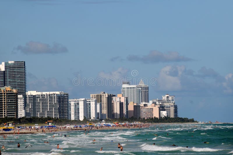 Tourists on Miami beach editorial photo. Image of coastline - 23267596
