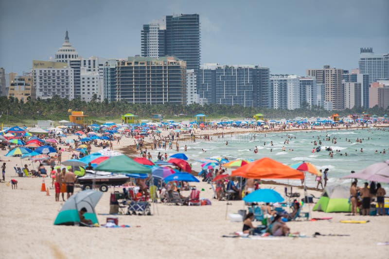 Tourists on Miami Beach. Getting Ready for a Day at the Beach Stock ...
