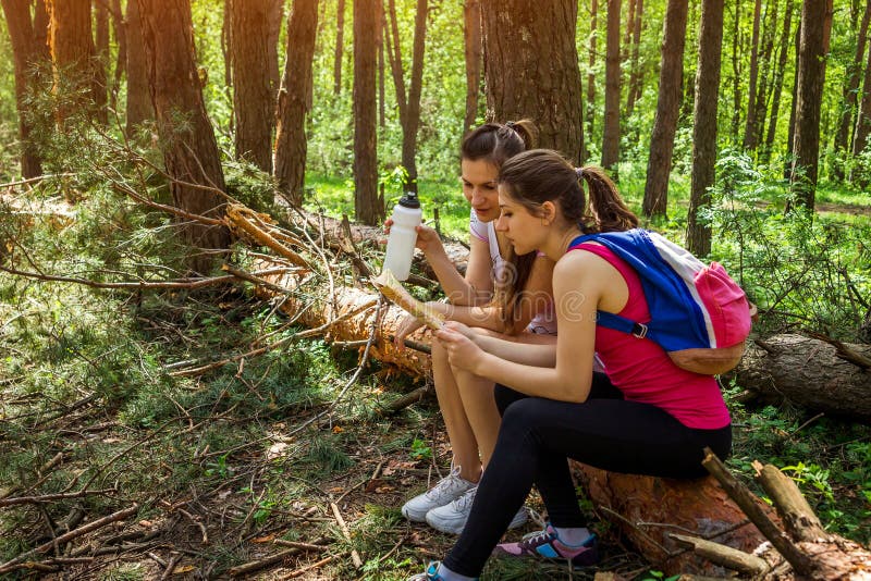 Tourists Searching for a Right Way Using a Map Stock Image - Image of ...