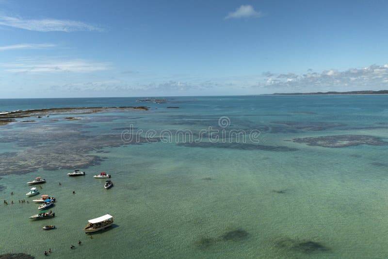 Tourists and Small Boats in a Natural Pool Formed by Reefs Stock Image ...