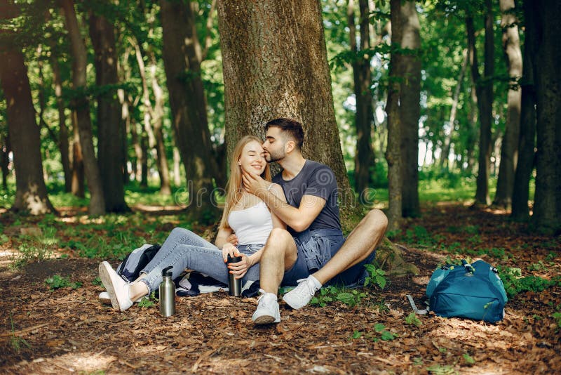 Cute Couple Have a Rest in a Summer Forest Stock Image - Image of girl ...