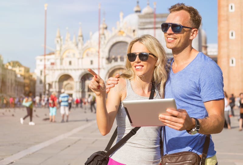 Tourists Using Tablet Computer while Traveling Stock Photo - Image of ...